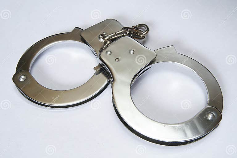 Chrome handcuffs stock photo. Image of justice, authority - 1446882