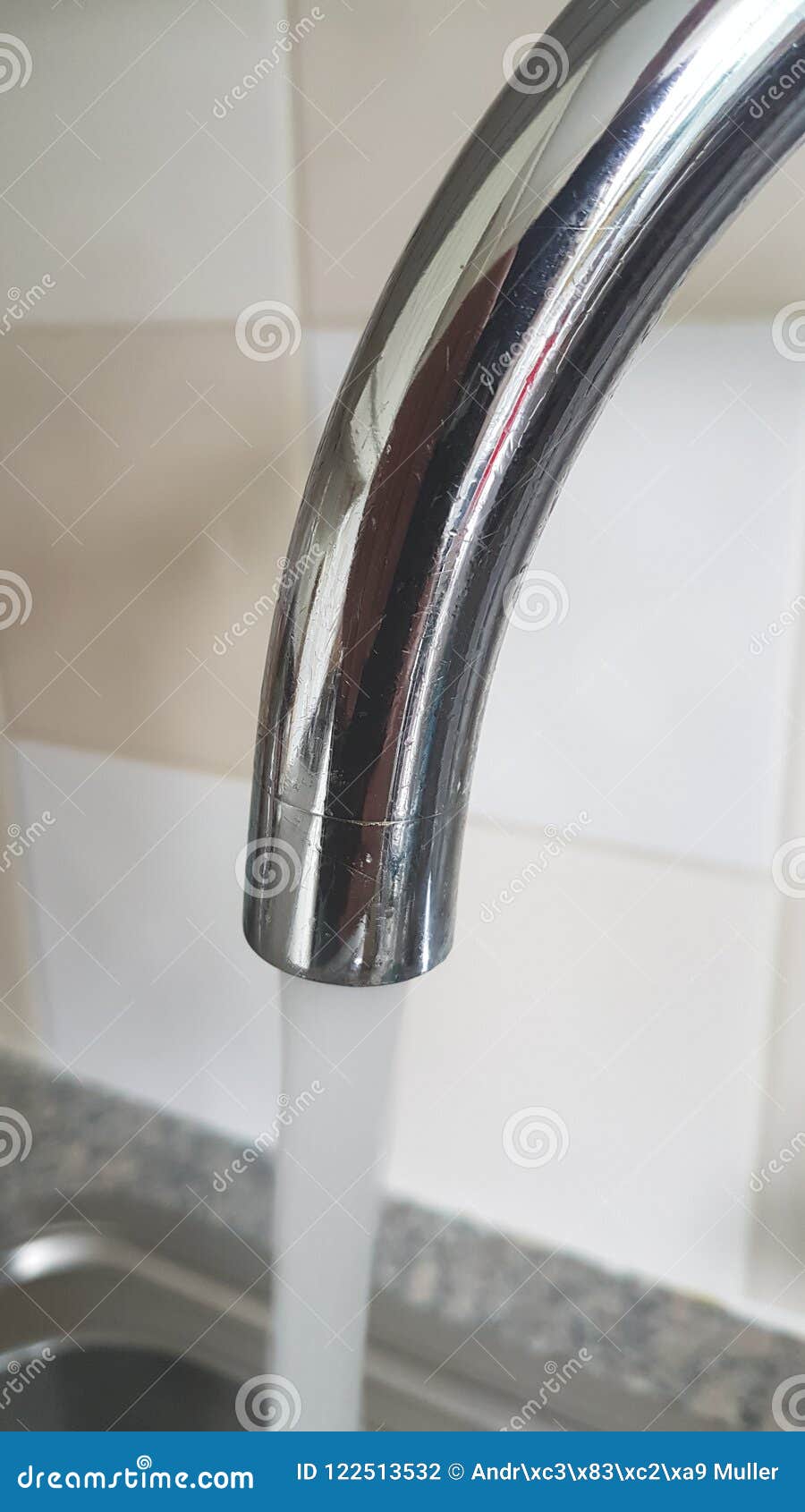 Chrome Plated Tap at Home Where Water is Coming Out.. Stock Photo ...