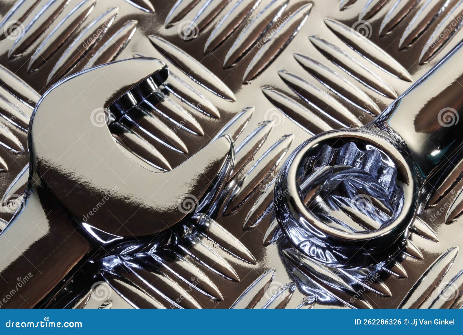 Chrome Spanner Heads on Metal Tread Plate Stock Photo - Image of ...