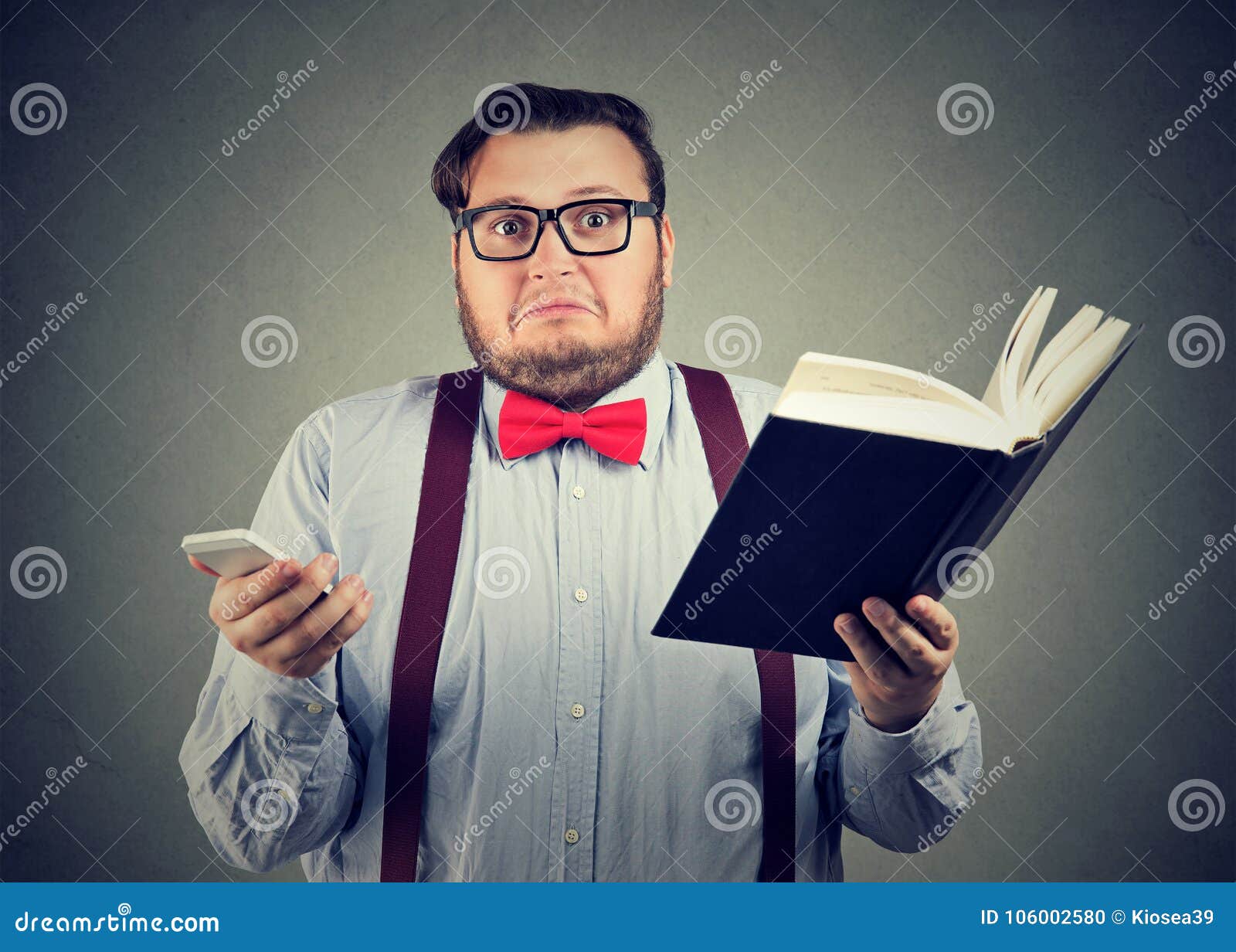 Man with Book and Smartphone Stock Photo - Image of knowledge, gadget ...