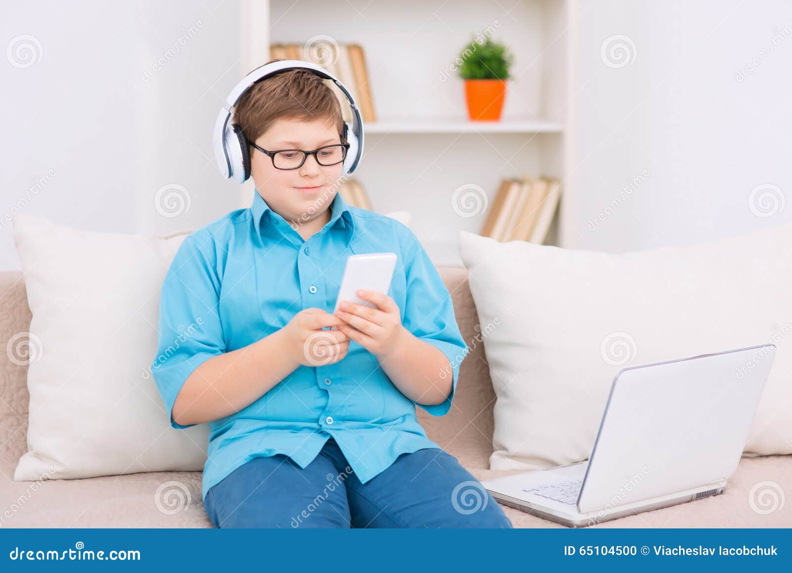 Chubby Kid is Using Smartphone Stock Photo - Image of indoors ...