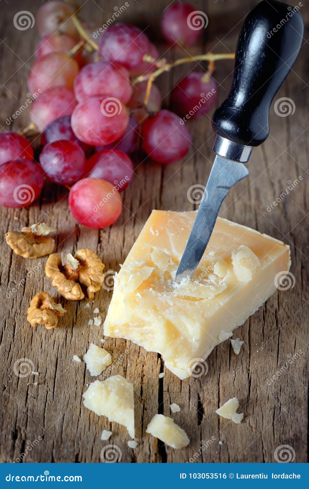 Chunk of parmesan cheese stock photo. Image of parmigiano - 103053516