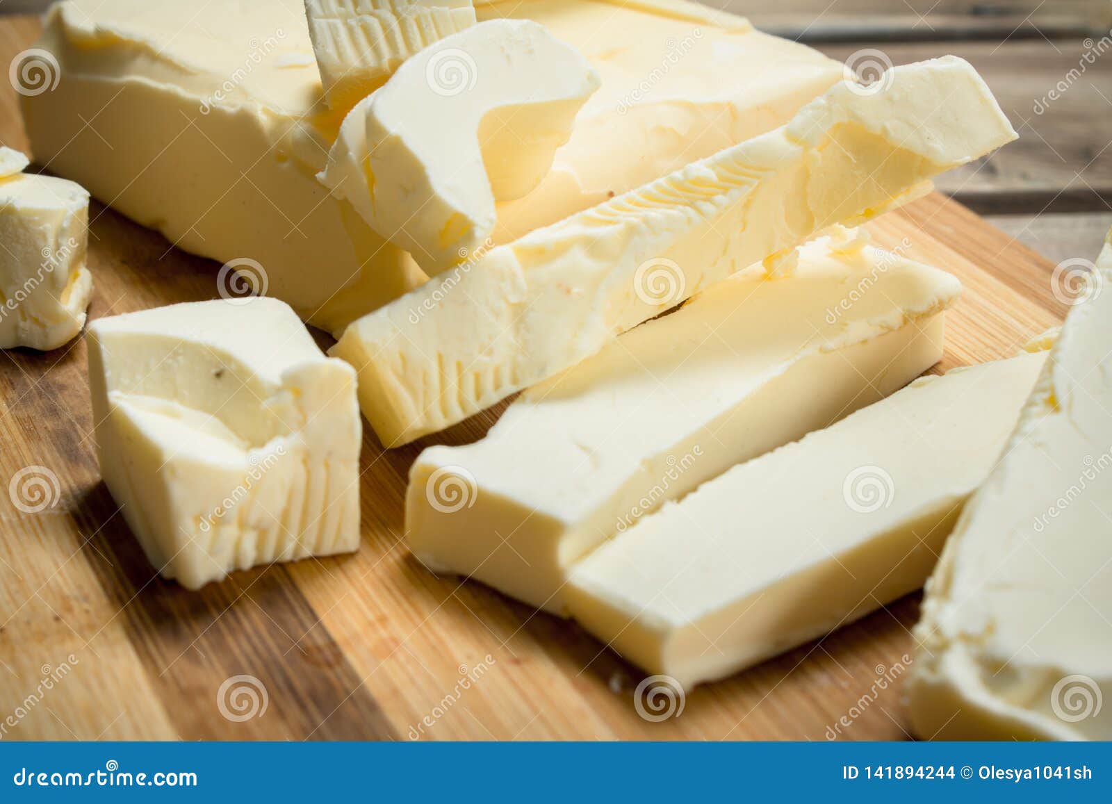 Chunks of butter stock photo. Image of cholesterol, wood - 141894244