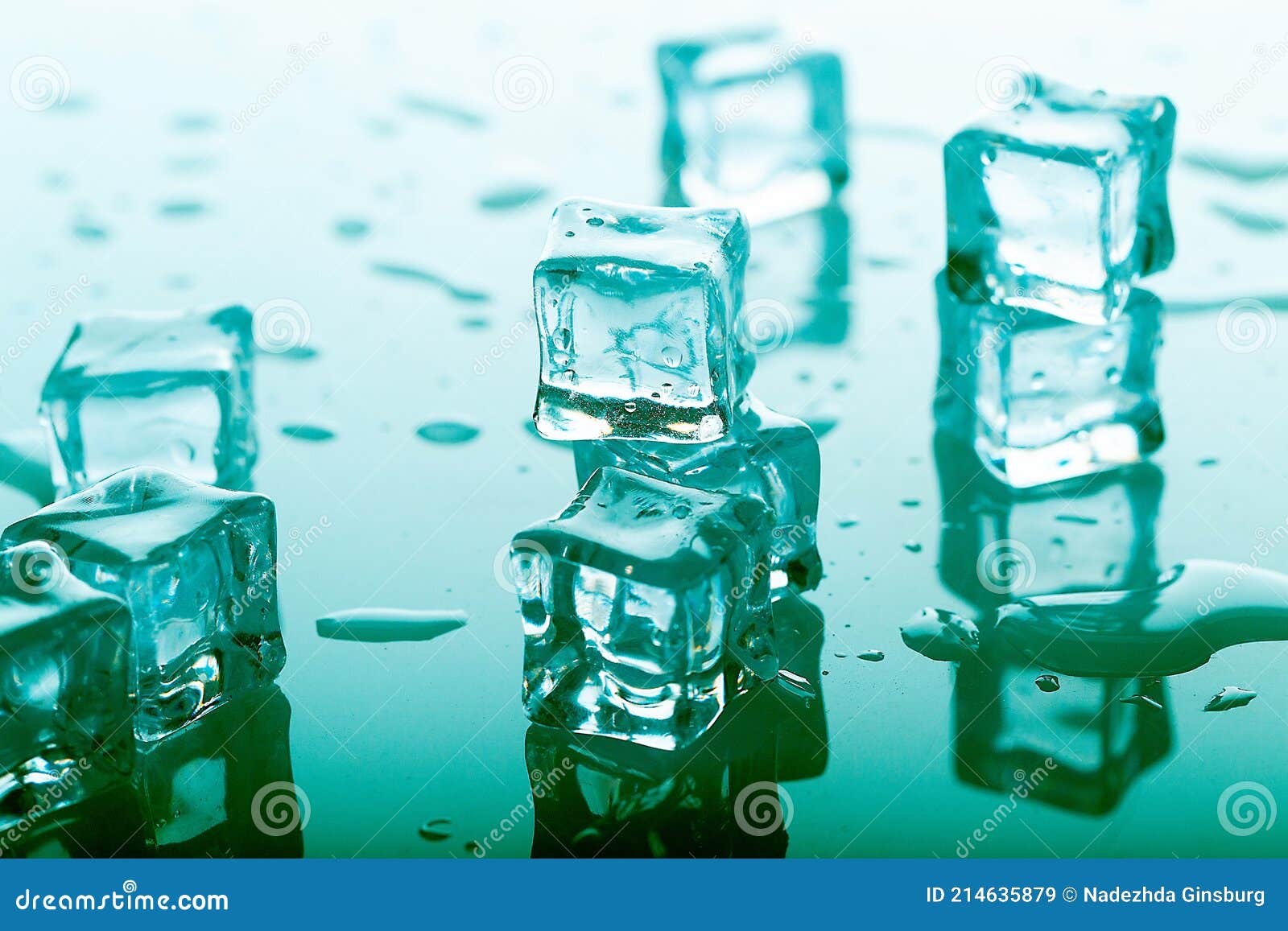 Chunks of Frozen Ice on a Glossy Surface with Drops of Clear Water ...