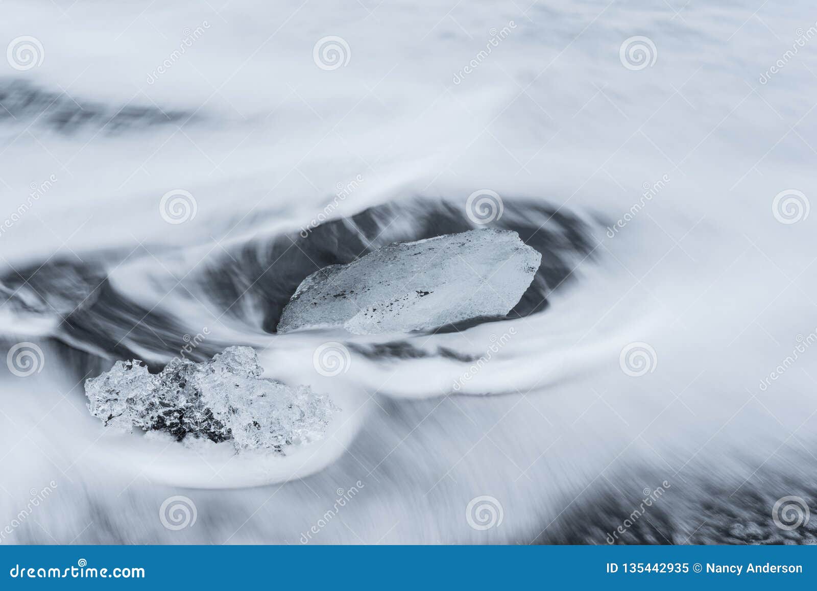 Chunks of Ice Broken from a Glacier on Diamond Beach in Iceland Stock ...
