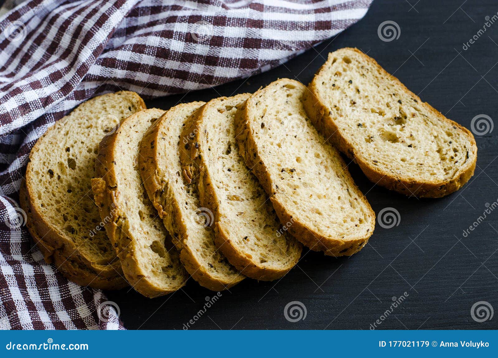 Chunks of Whole-grain Bread on the Dark Table. Stock Image - Image of ...