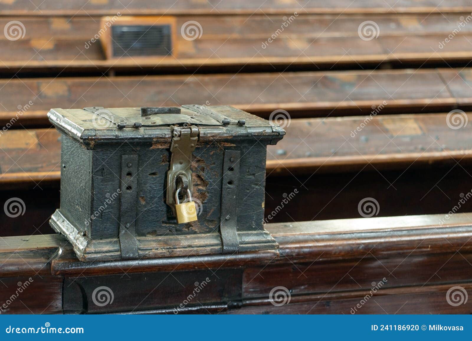 The Church Money Box Mounted on a Pew in the Church Stock Photo - Image ...