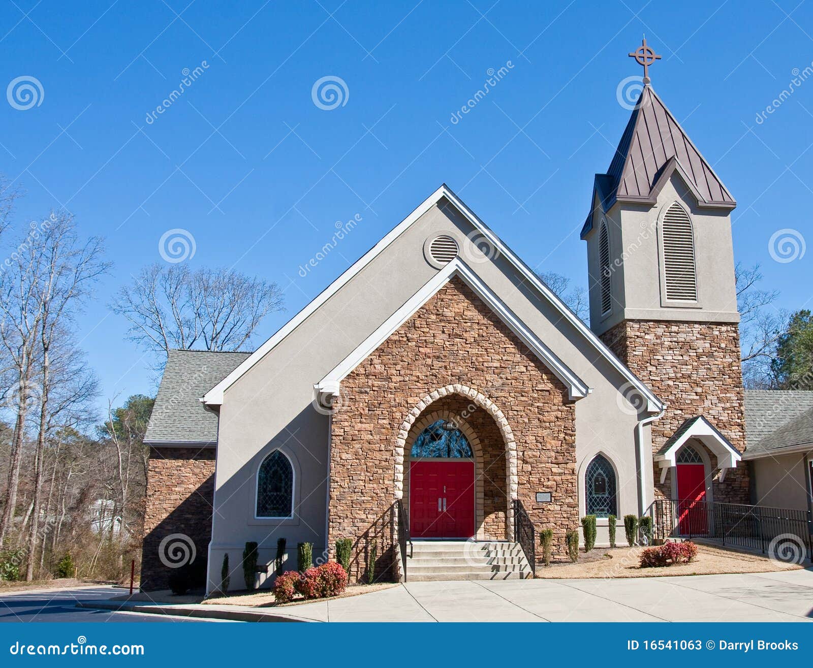 Church with Stone Face and Red Doors Stock Image - Image of church ...