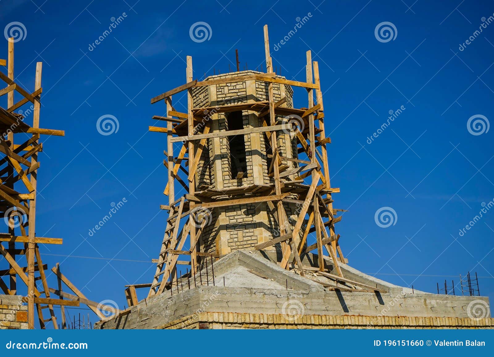 Church under construction. stock photo. Image of crane - 196151660