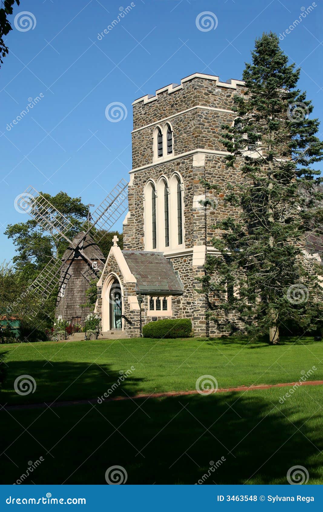 Church and the WIndmill stock photo. Image of water, scene - 3463548