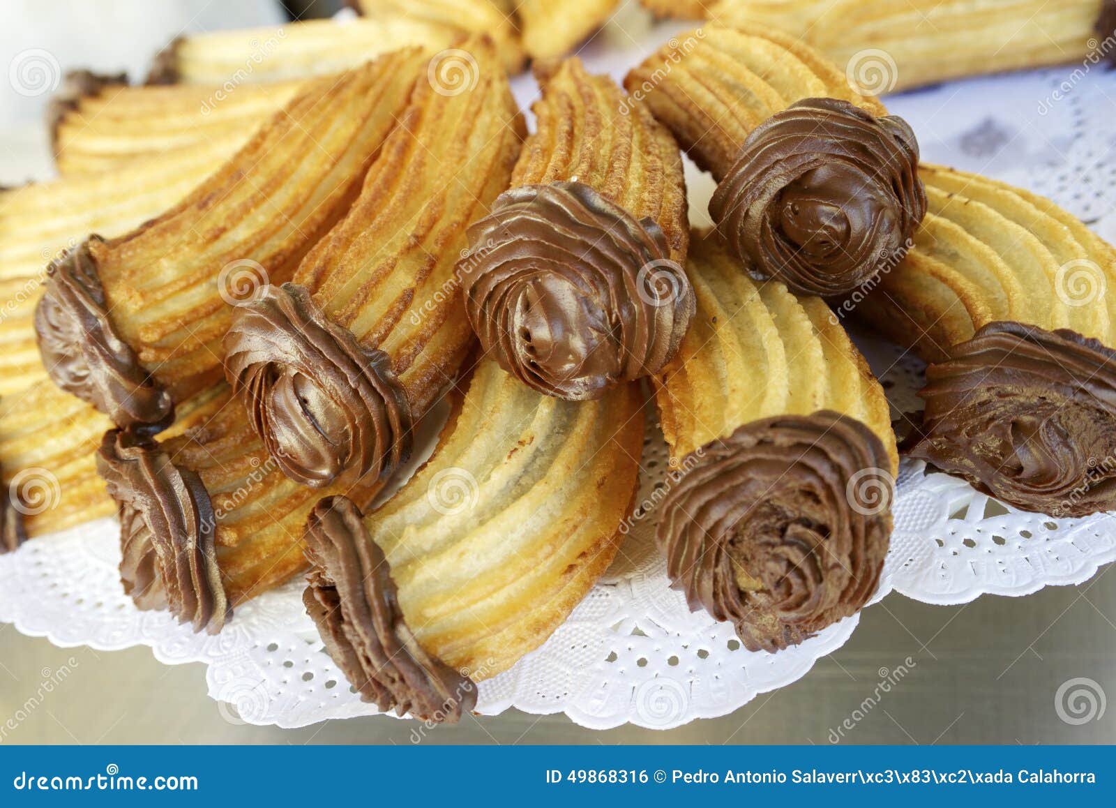 Porras, Thick Churros Typical Of Spain, Dipped In Hot Chocolate Stock ...