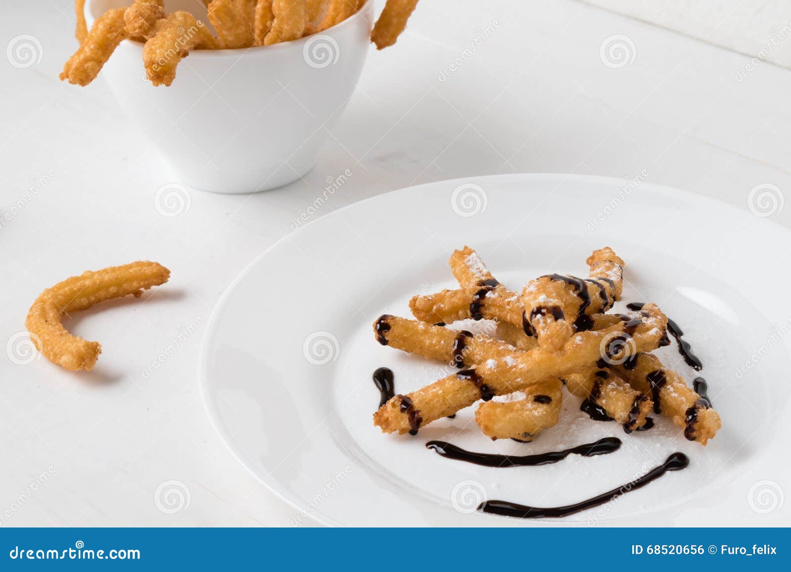 Churros on Plate with Chocolate Stock Photo - Image of snack, doughnut ...
