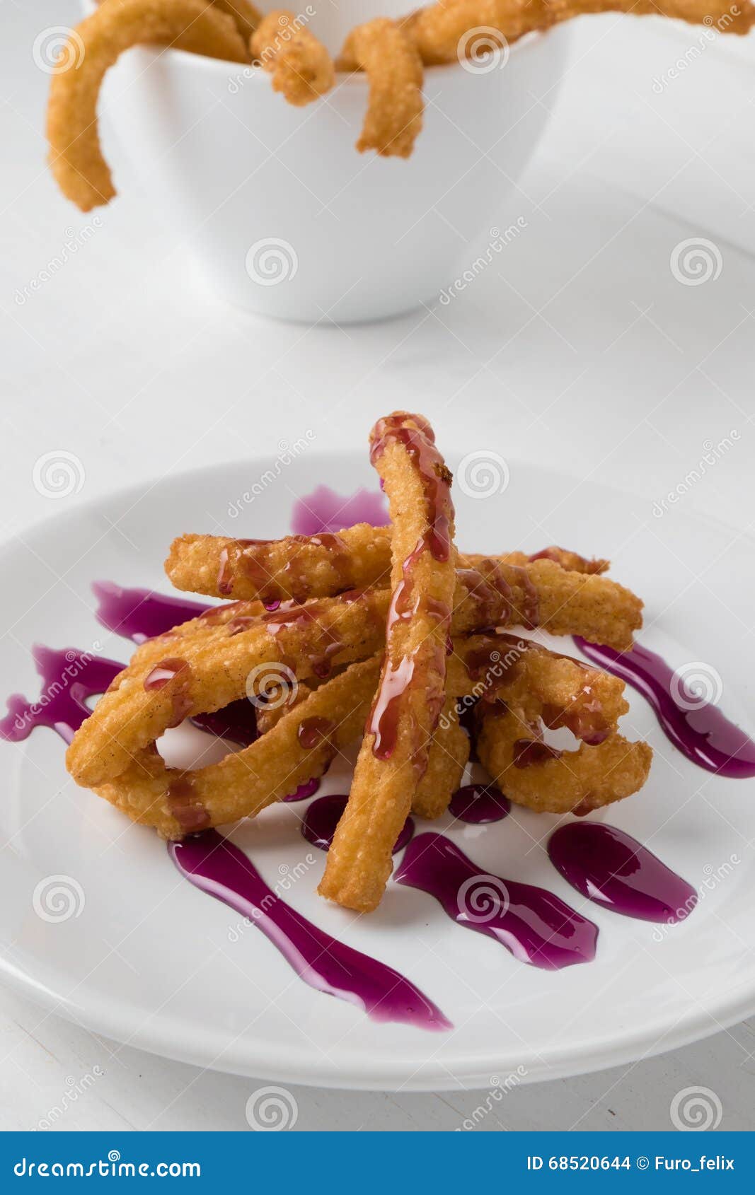 Churros on Plate with Fruit Syrup Stock Photo - Image of delicious ...