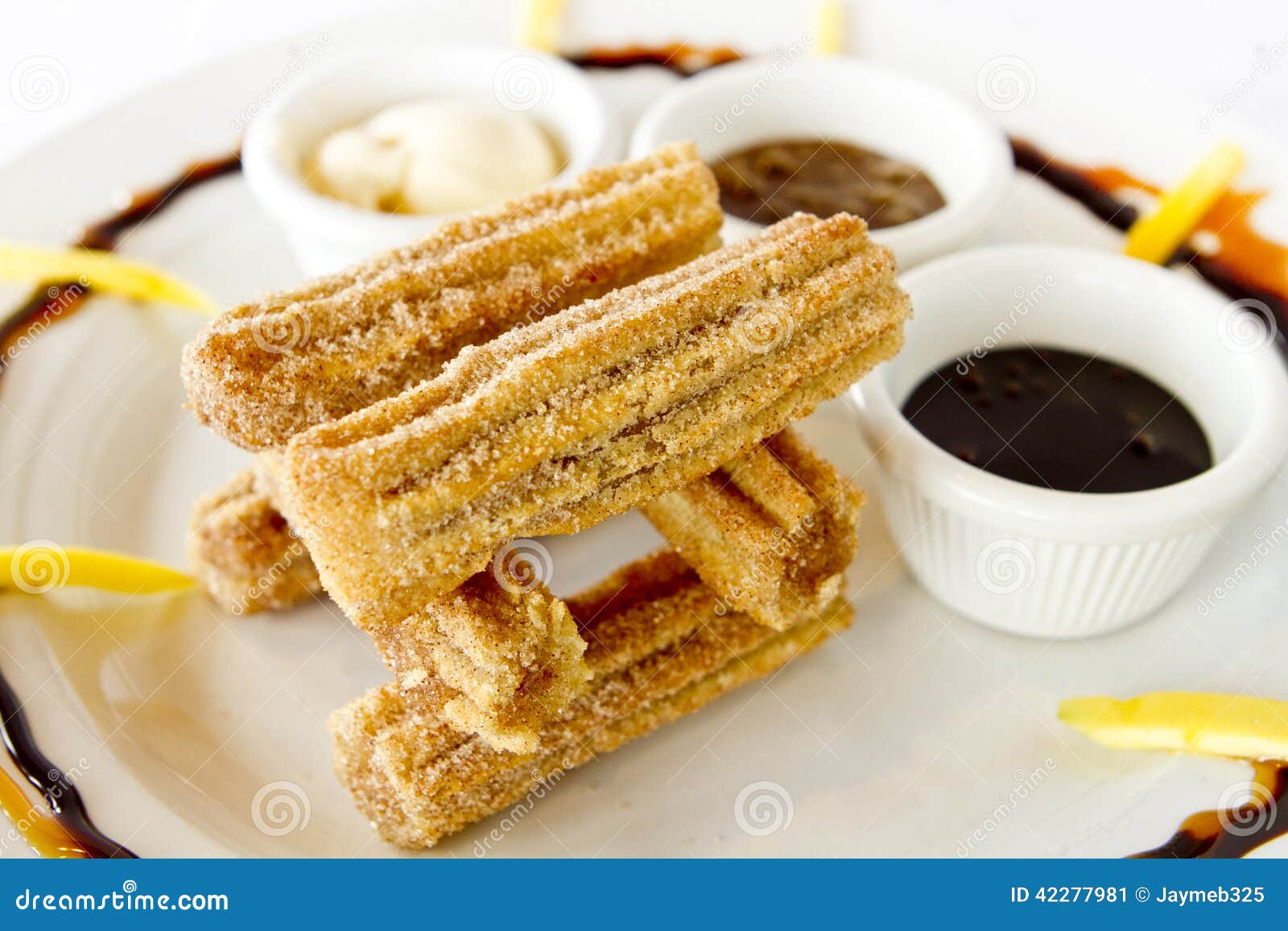Churros stock image. Image of sauce, tower, dessert, dulce - 42277981