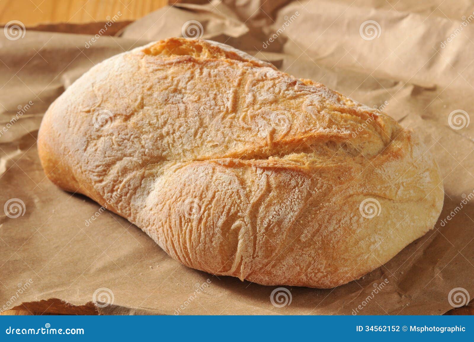 Ciabatta Loaf of Bread in Brown Paper Stock Photo - Image of product ...