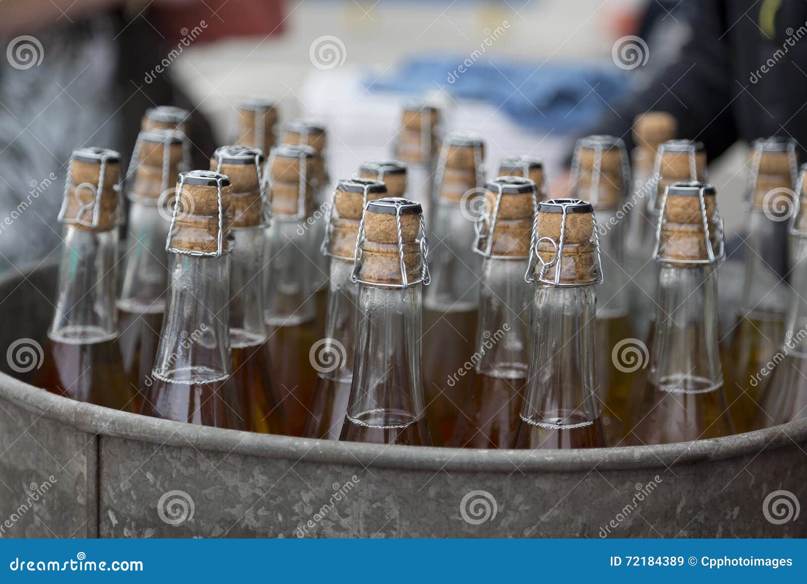Cider bottles in a bucket stock image. Image of plenty - 72184389