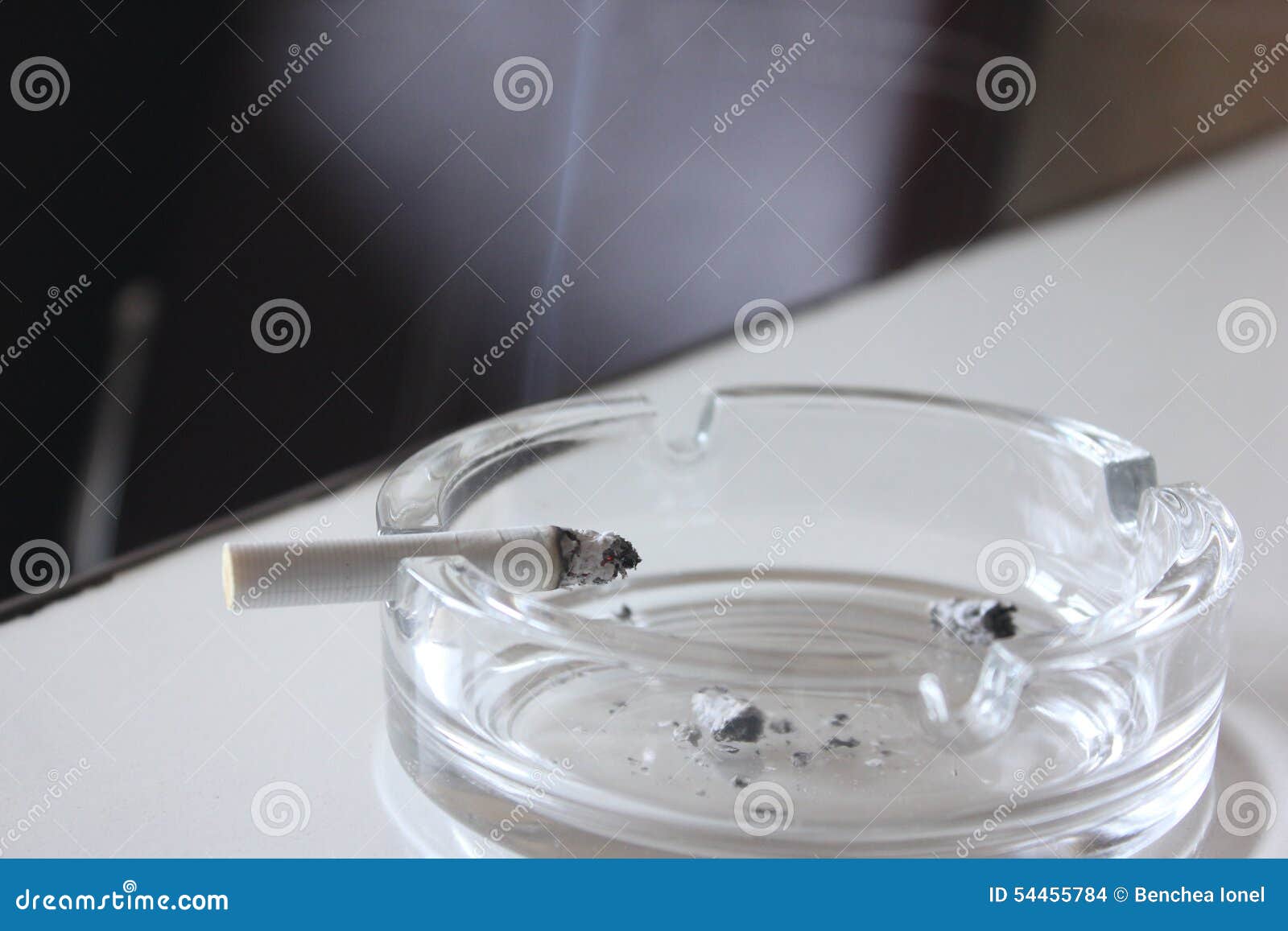 Cigarette in ashtray stock photo. Image of indoor, habit - 54455784
