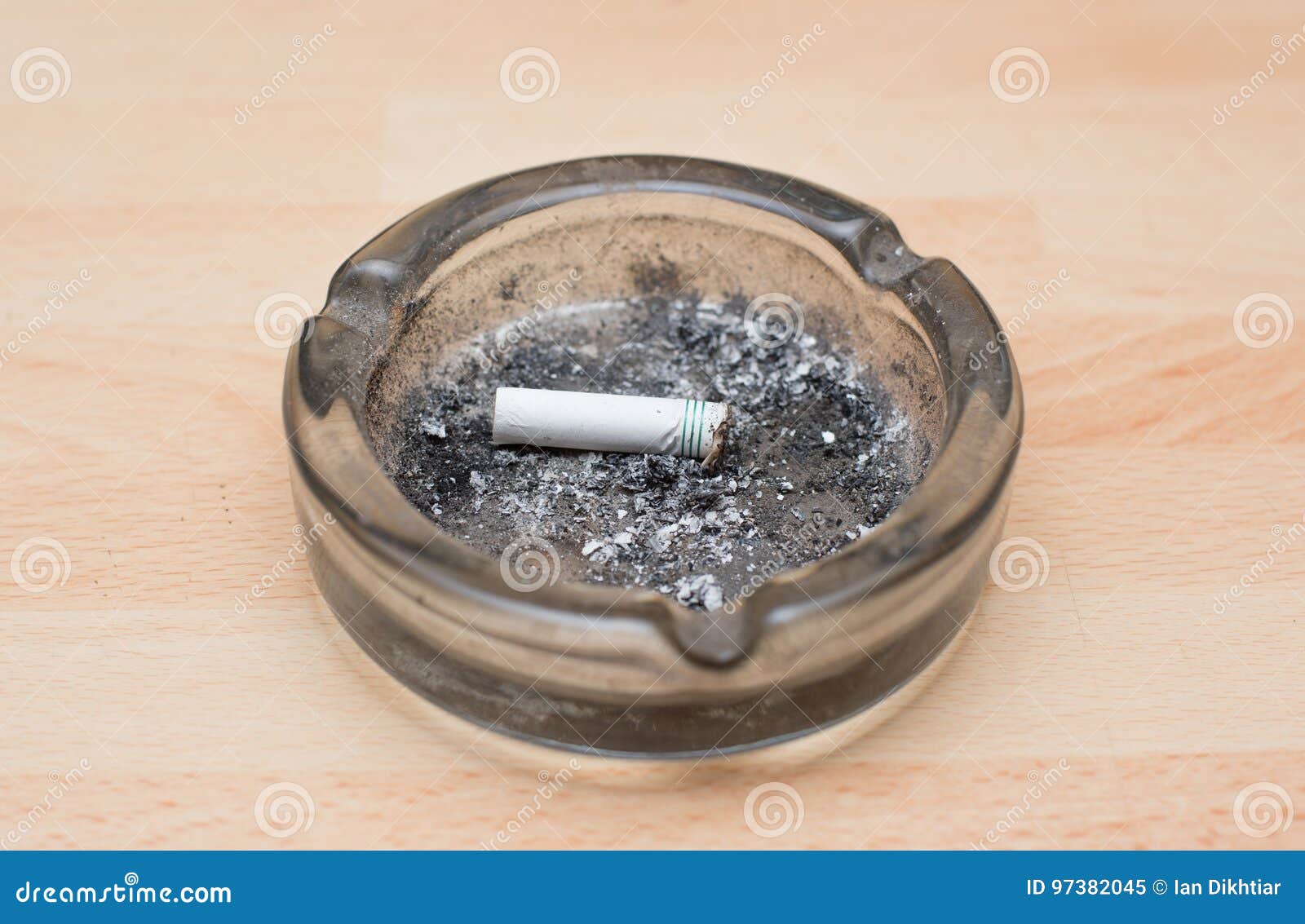 Cigarette in an ashtray stock image. Image of odor, color - 97382045