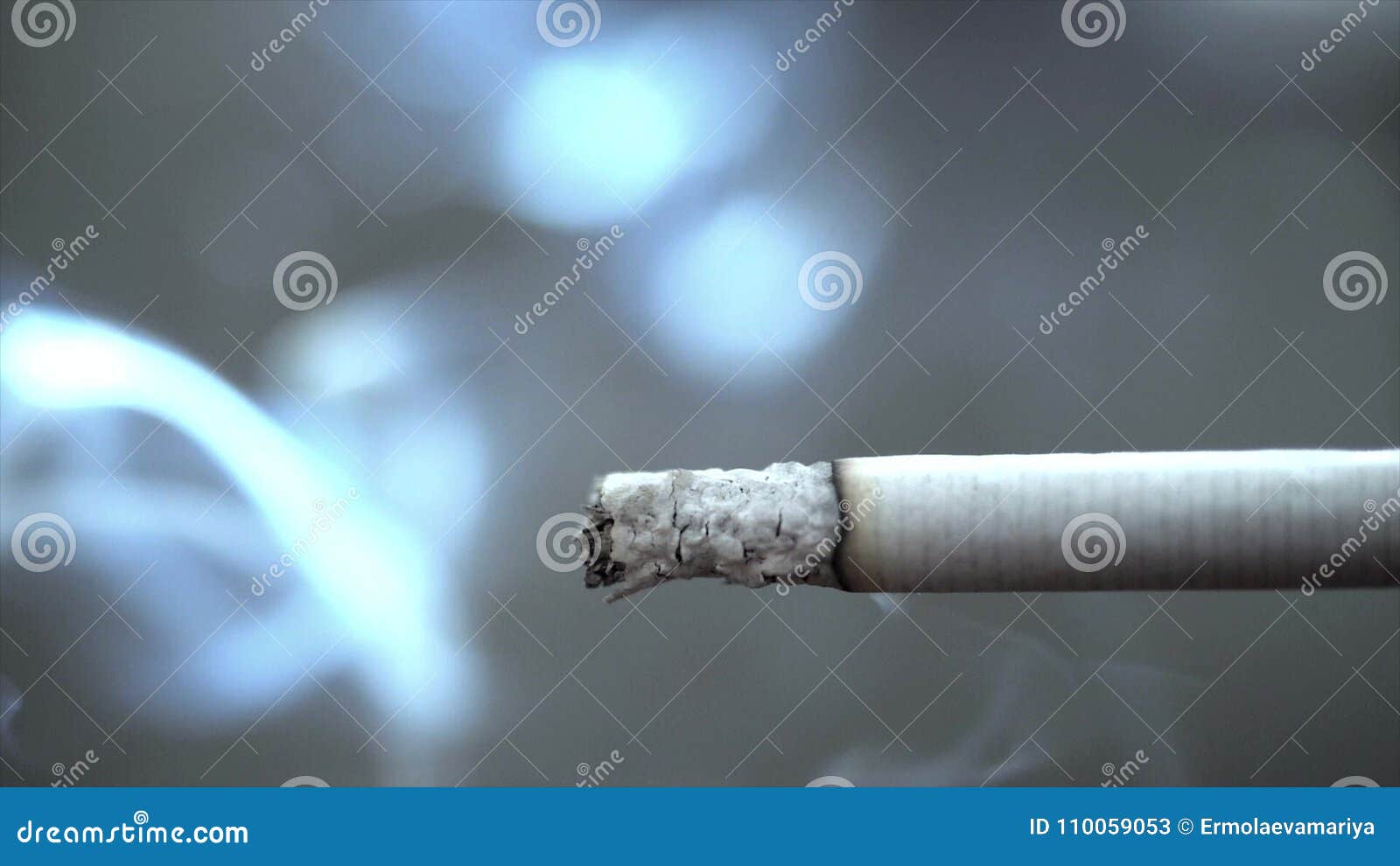 Cigarette Burning with Smoke Flowing Up into the Darkness Stock Image ...
