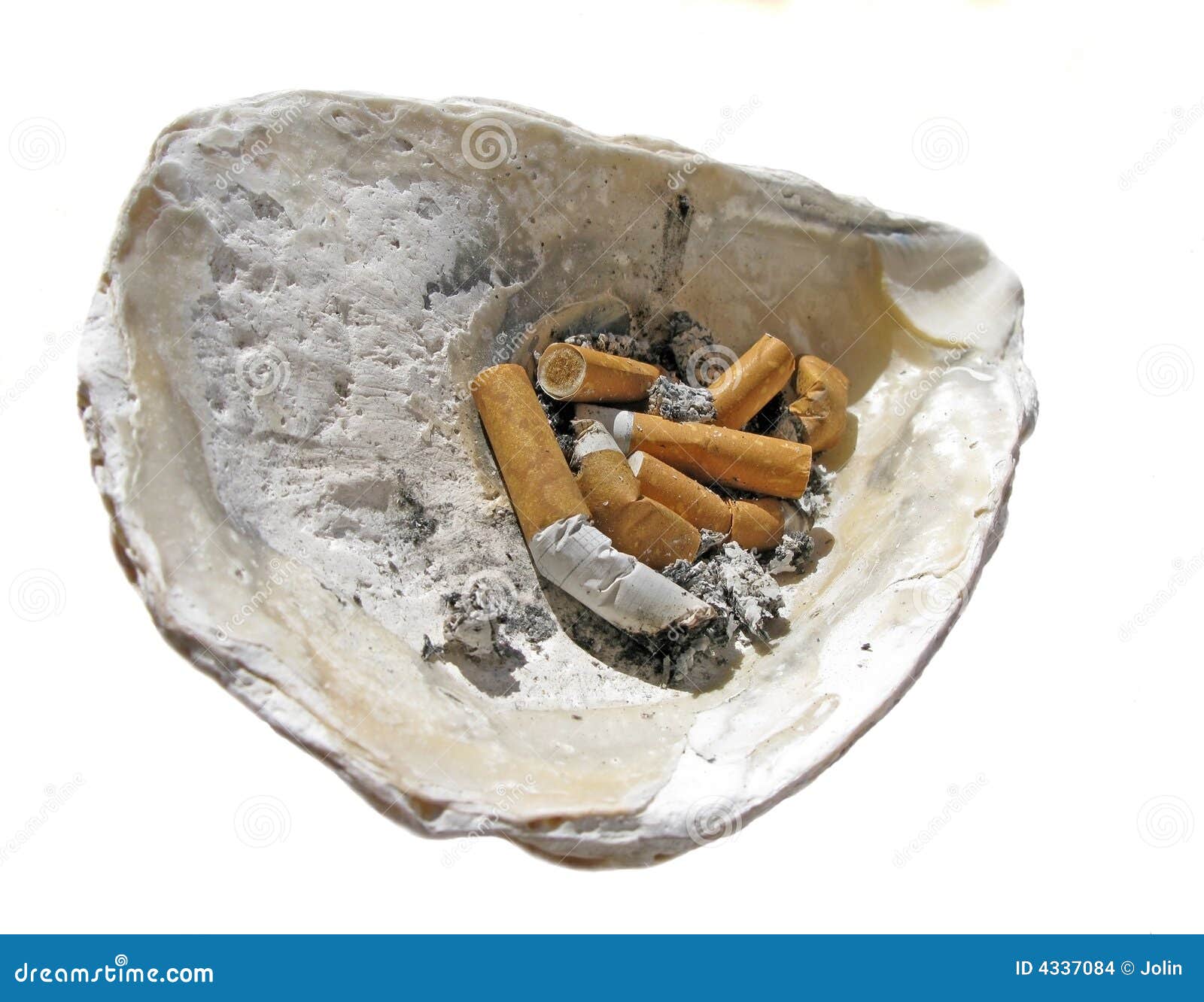 Cigarette Butt In The Shell Ashtray Picture. Image: 4337084