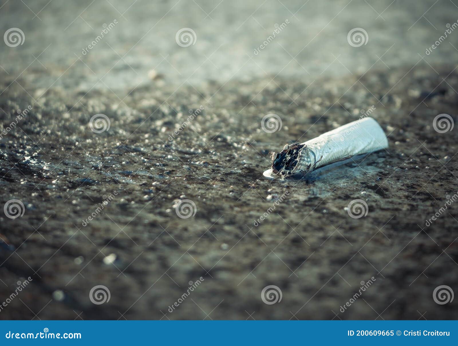 A Cigarette Tossed on the Ground Stock Image - Image of garbage, waste ...