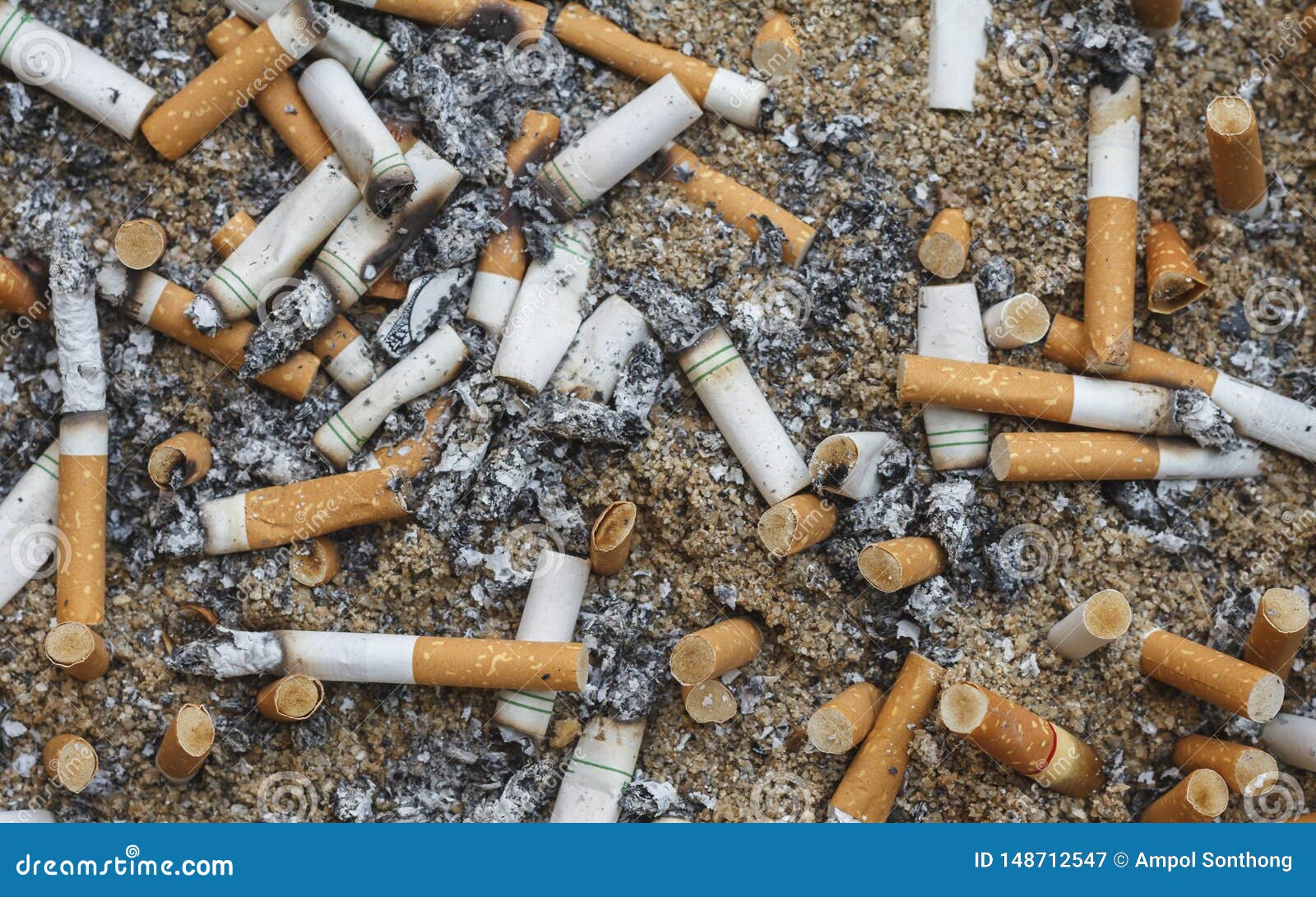 Cigarette Butts Discarded on Sand. Stock Image - Image of hazards ...