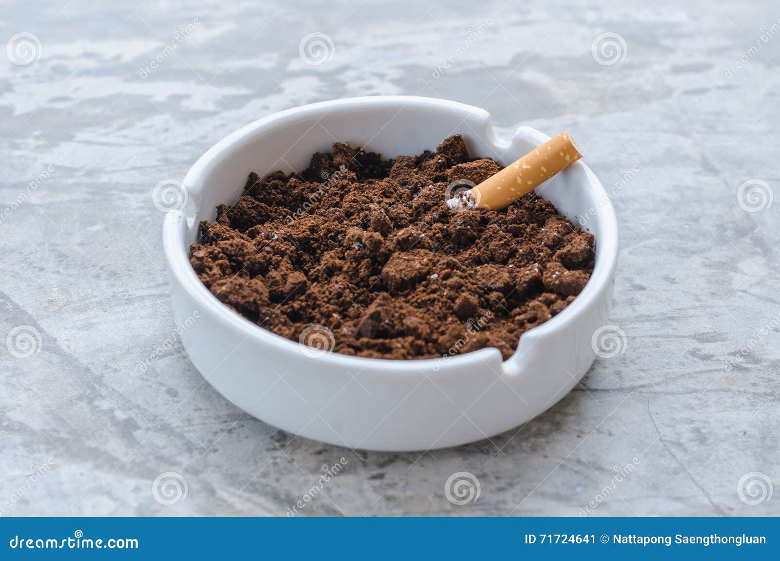 Cigarette and Coffee Ground on the Ceramic Ashtray. Stock Image - Image ...