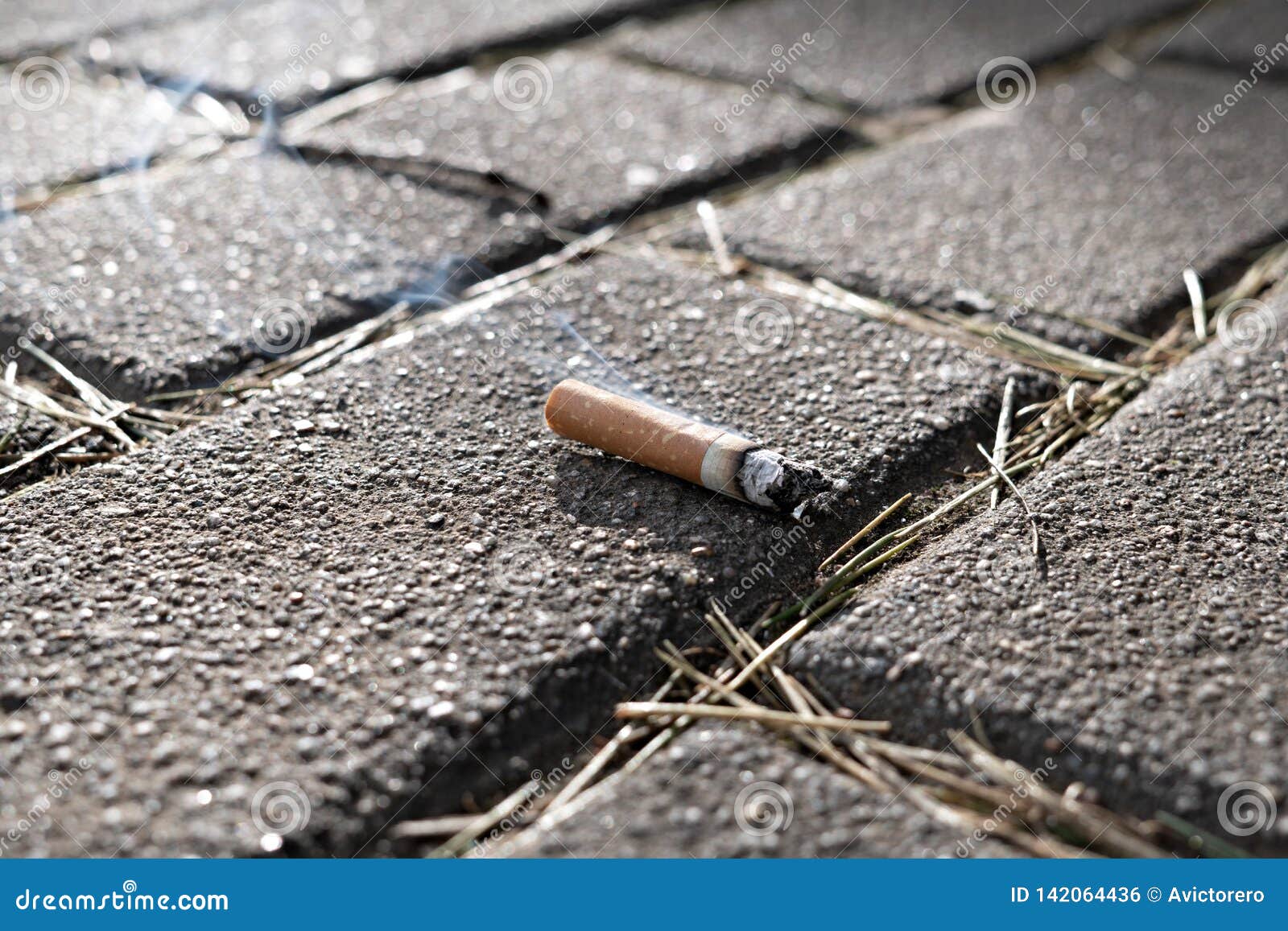 Cigarette End on Floor. Smoking Stock Photo - Image of burning, fire ...