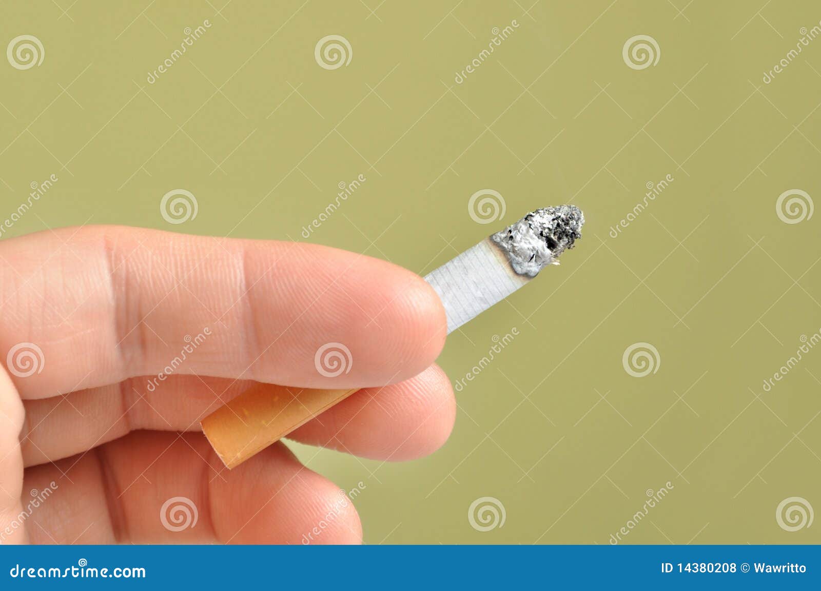Cigarette in hand stock photo. Image of nicotine, cancer - 14380208