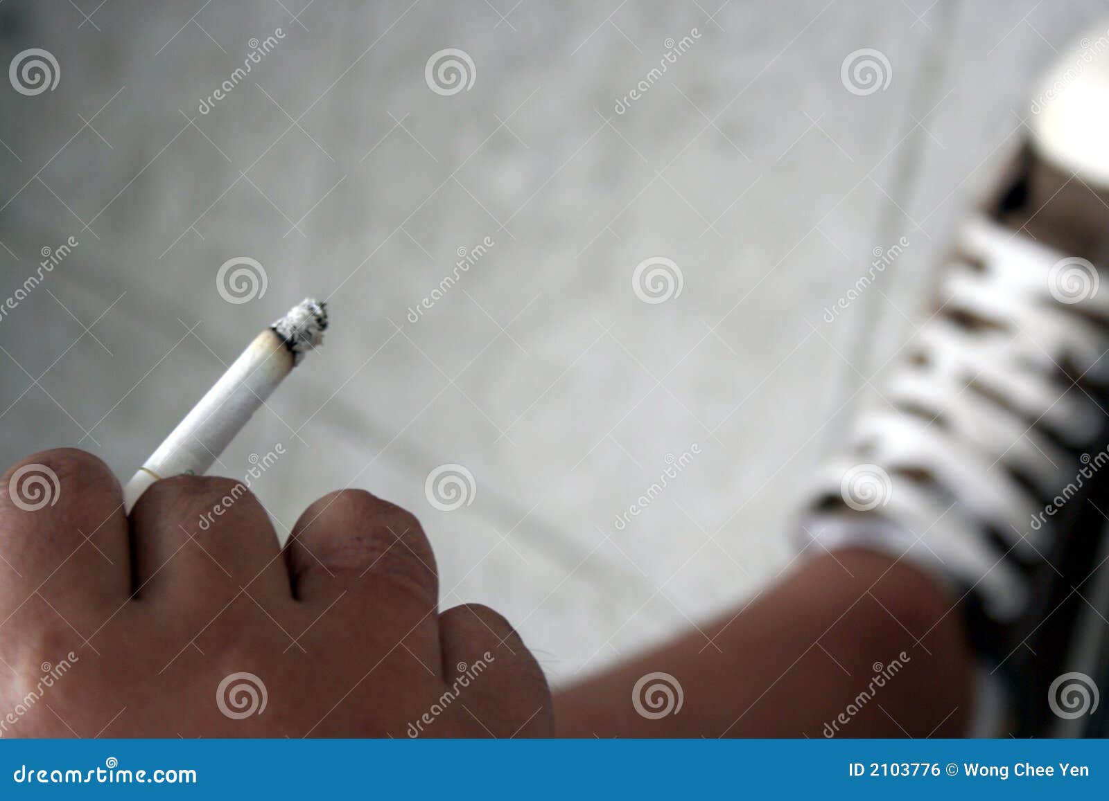 Cigarette in hand stock photo. Image of smoker, slowburn - 2103776