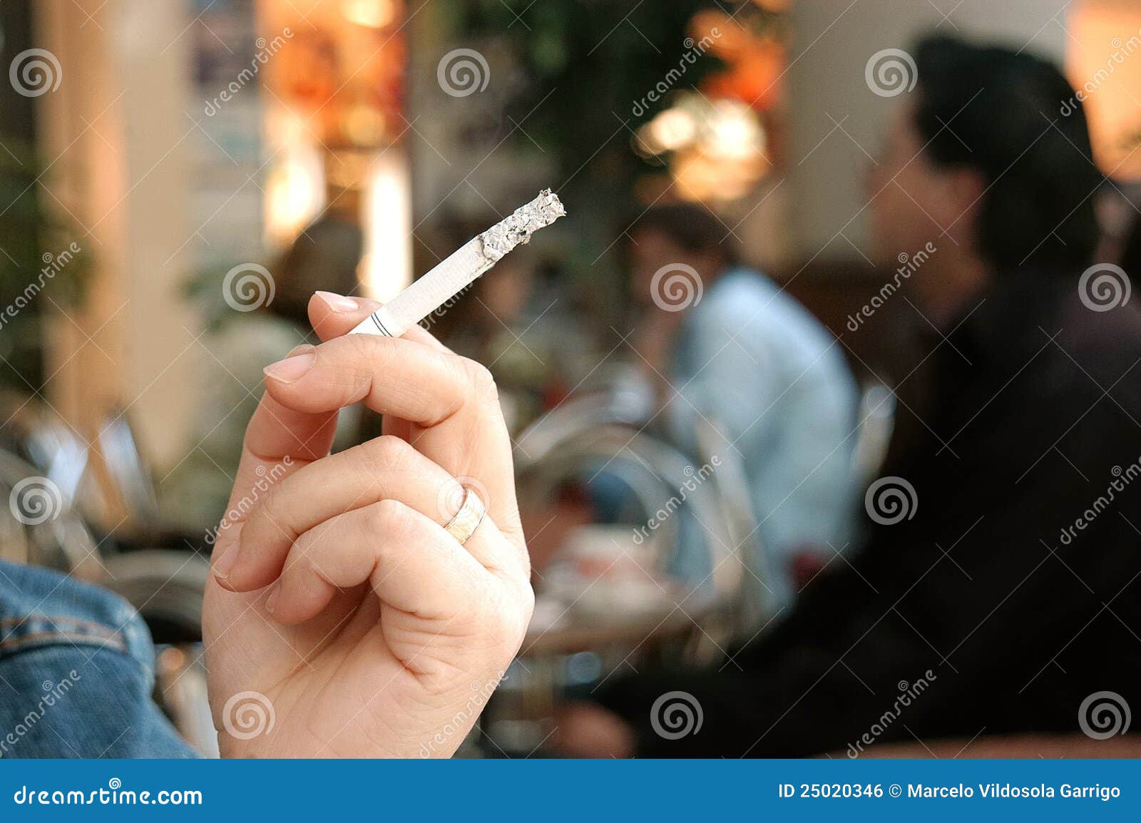 Cigarette in hand stock photo. Image of cigarettes, smoke - 25020346