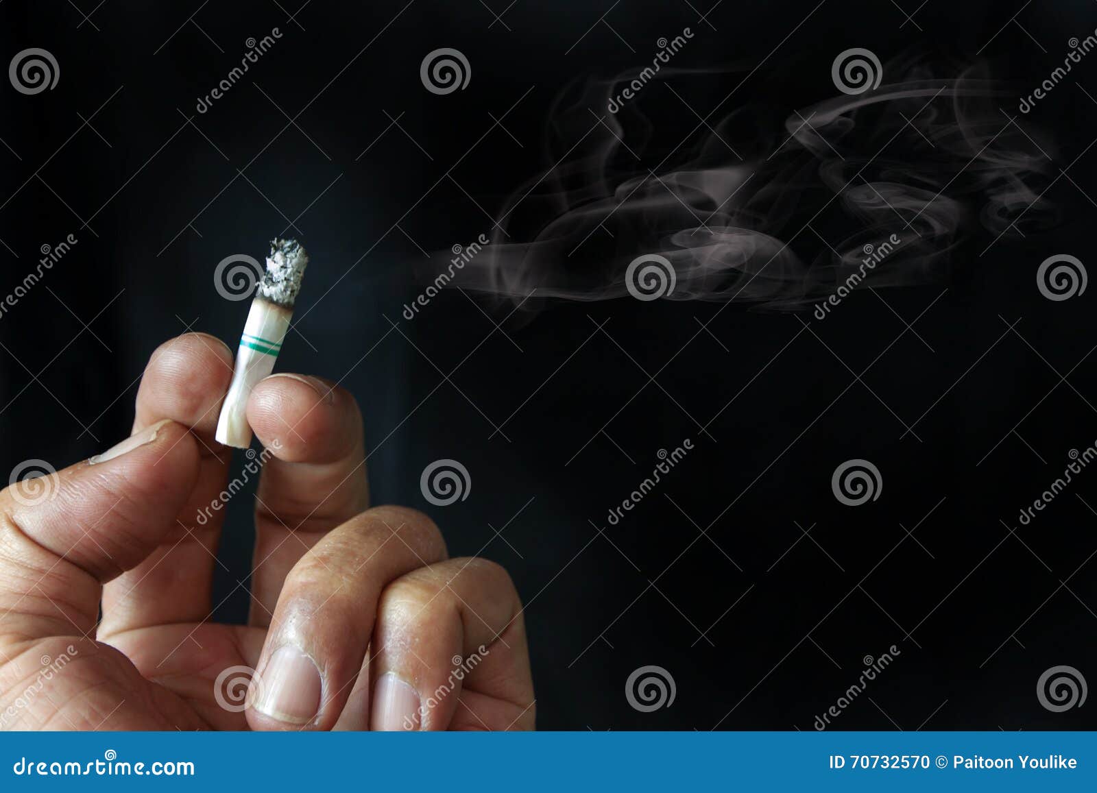 Cigarette in hand stock photo. Image of hands, cigarette - 70732570