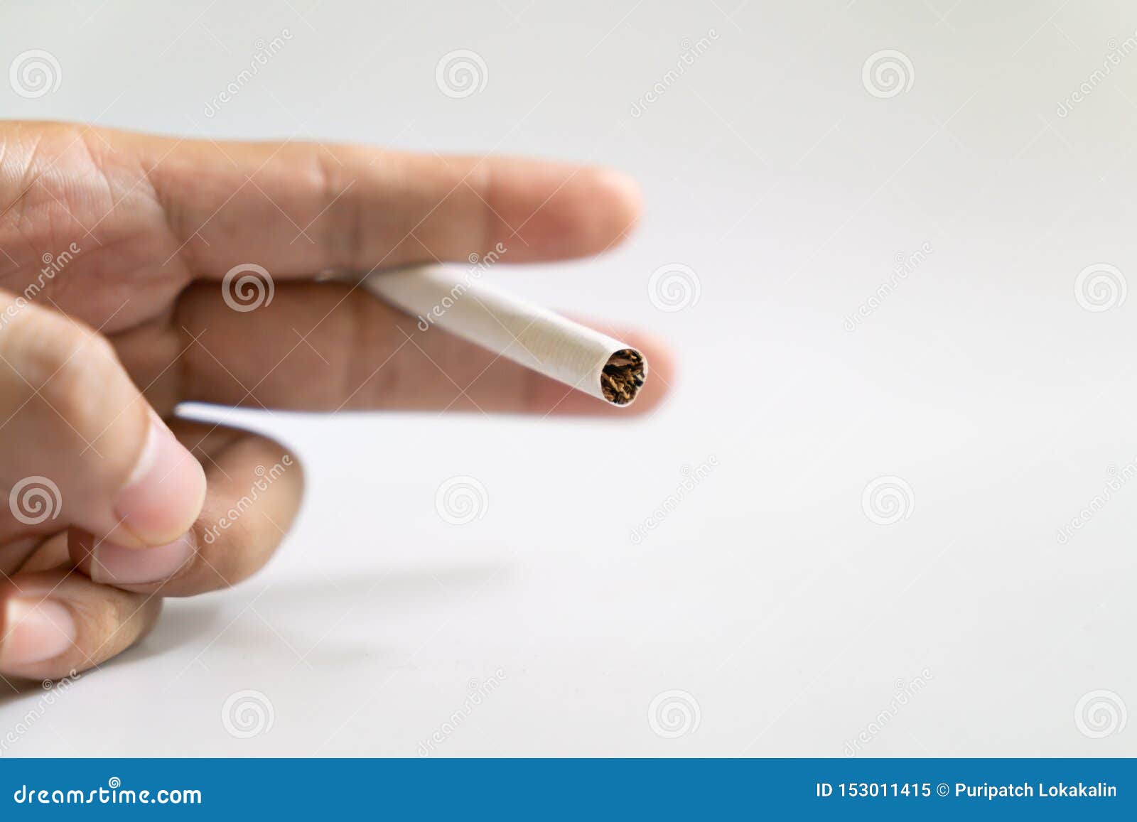 Cigarette in hand stock image. Image of danger, clamp - 153011415
