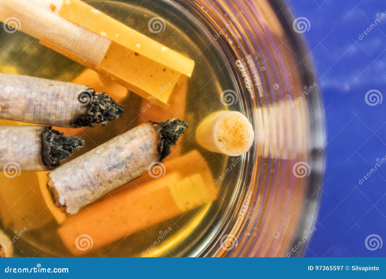 Cigarette soaked in water stock image. Image of habit - 97365597