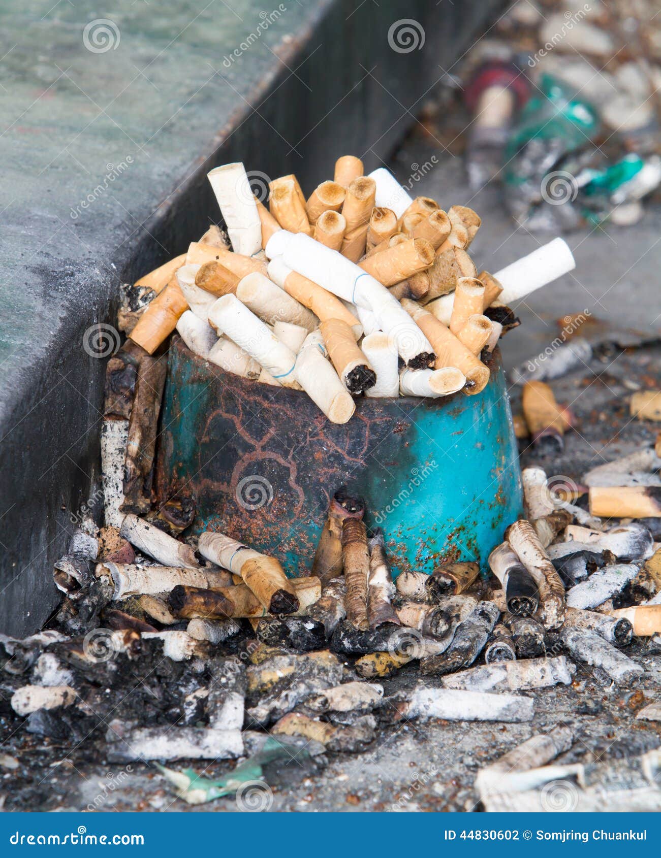 Cigarettes in can ashtray. stock photo. Image of dirty - 44830602