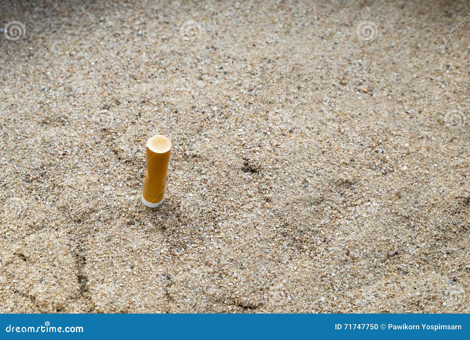 Cigarettes in sand ashtray stock photo. Image of addictive - 71747750