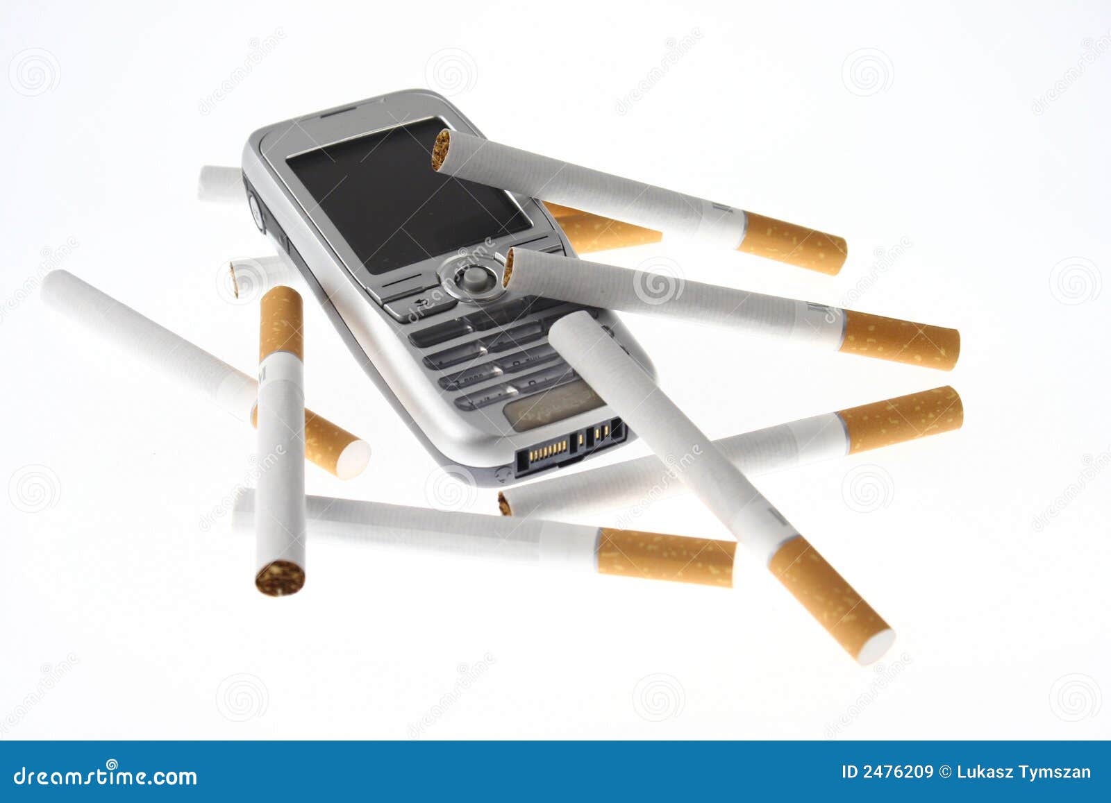Cigarettes and cell phone stock image. Image of telephone - 2476209