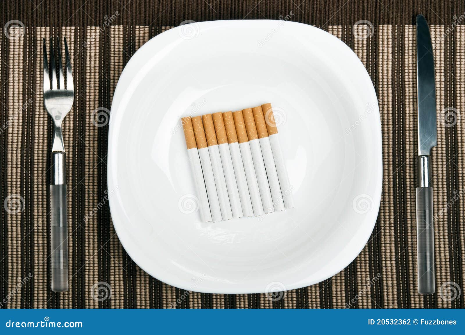 Cigarettes on food plate stock photo. Image of eating - 20532362