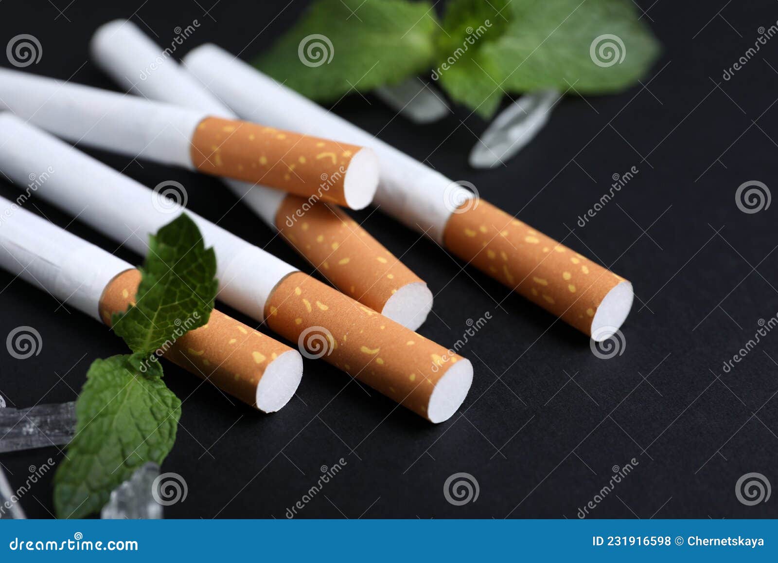 Cigarettes, Menthol Crystals and Mint on Black Background, Closeup ...