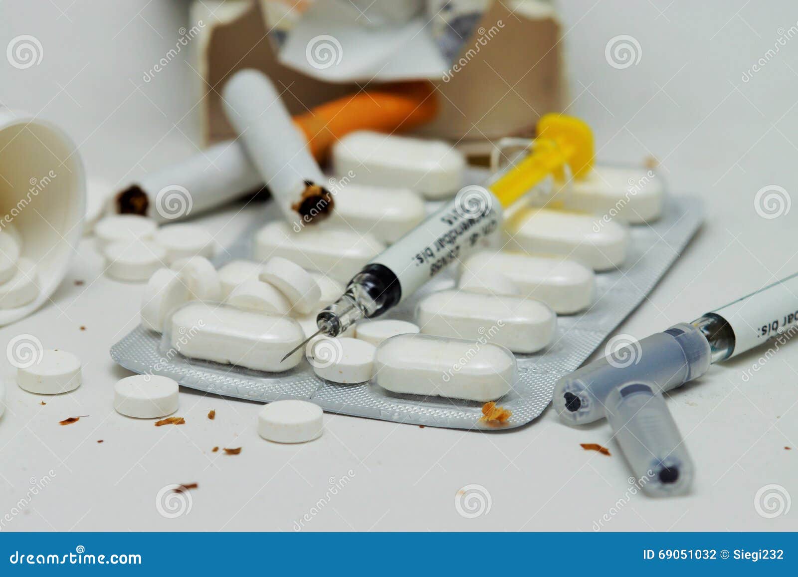 Cigarettes and pills stock photo. Image of drugs, white - 69051032