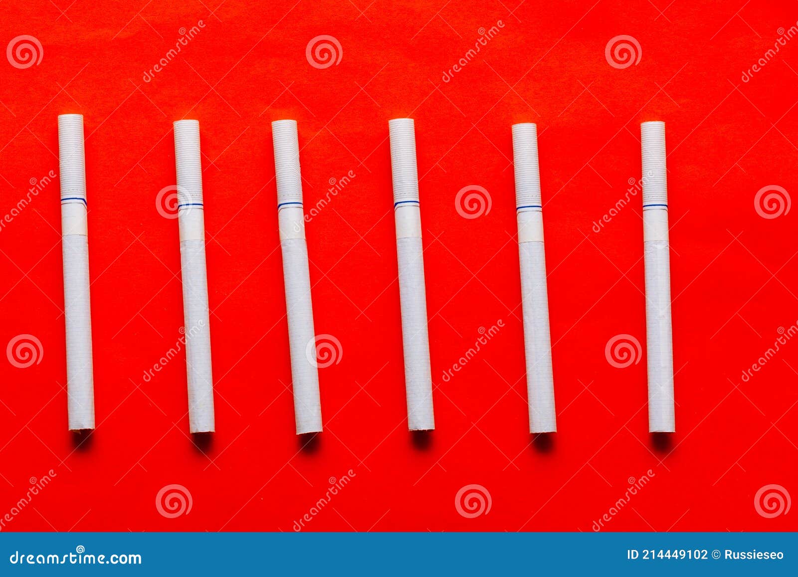 Cigarettes at red stock photo. Image of forbidden, cigarettes - 214449102