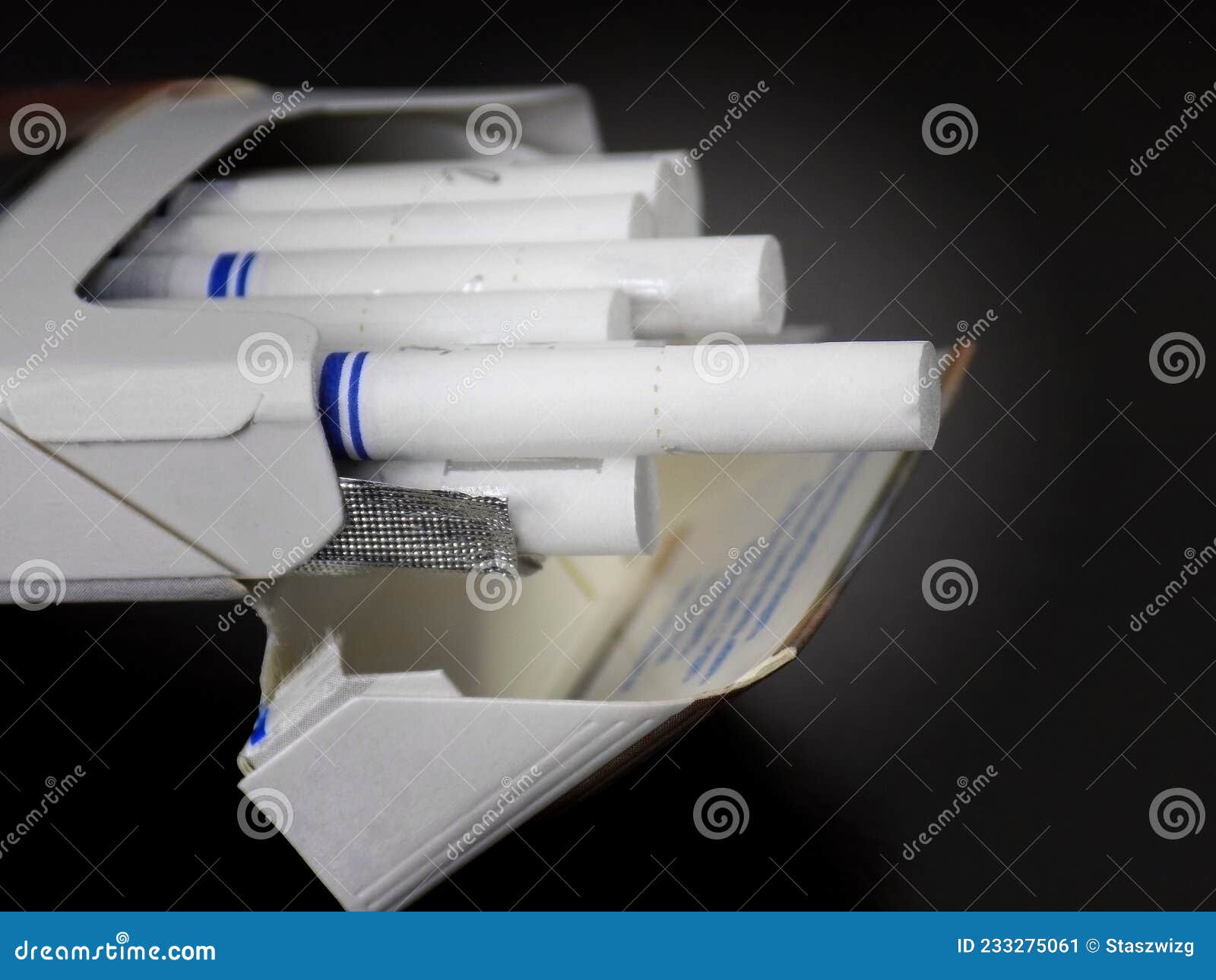 Cigarettes with White Filter Paper. Close-up on a Dark Background ...