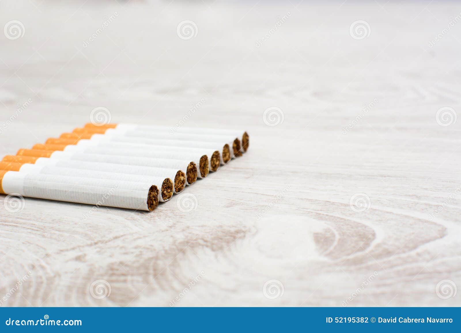 Cigarettes on wood table stock photo. Image of unpleasant - 52195382