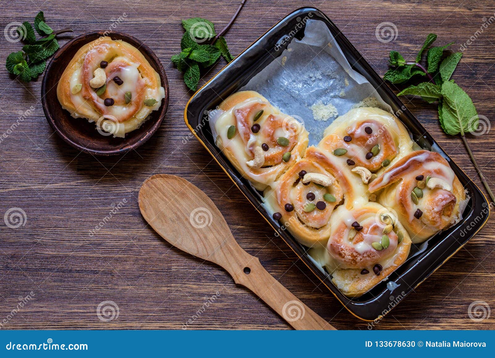 Cinnabon with Cream Cheese, Cashews and Chocolate Chips Stock Photo ... Cinnabon with Cream Cheese, Cashews and Chocolate Chips Stock Photo ...