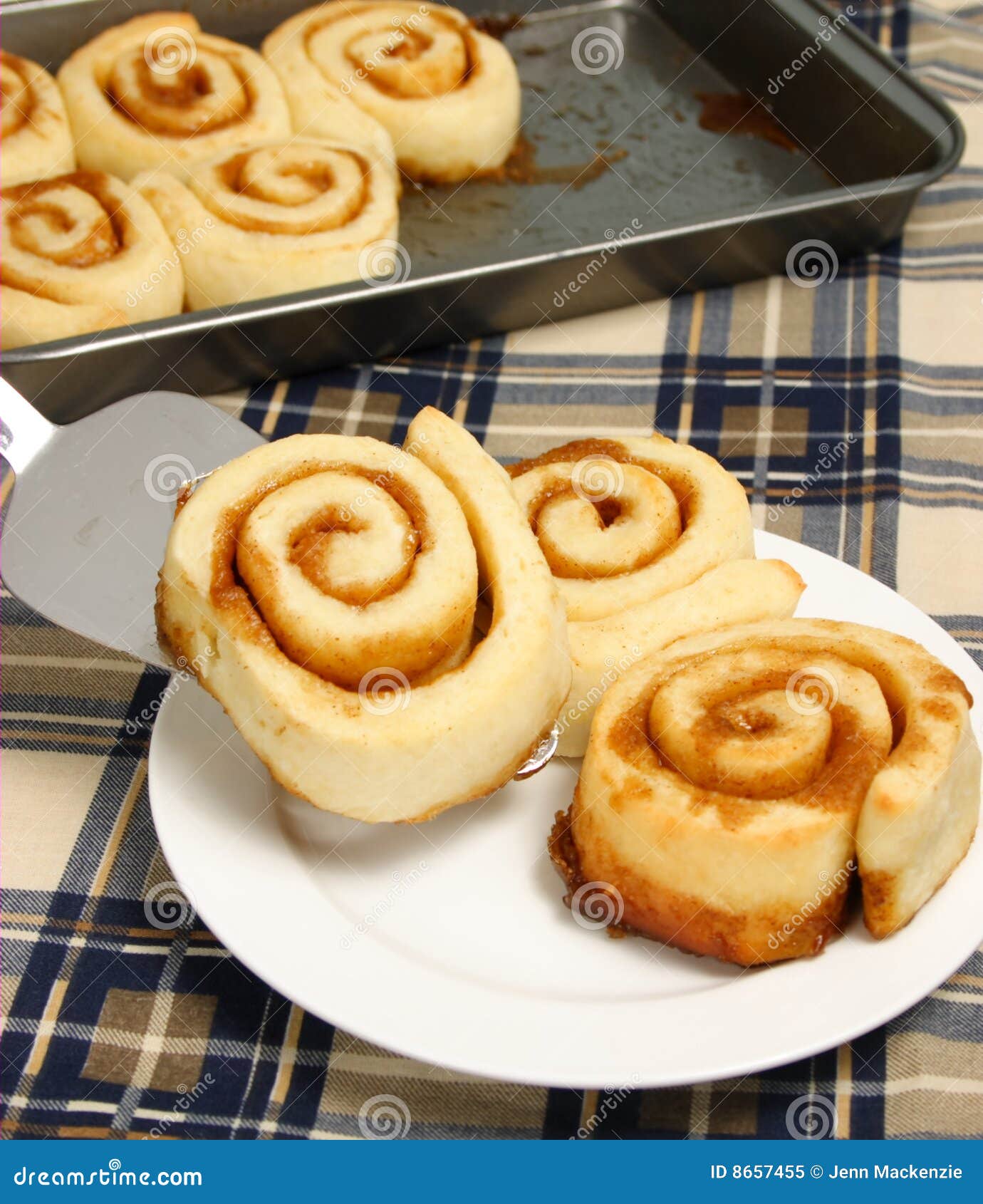 Cinnamon Bun Going Onto a Plate Stock Image - Image of breakfast, fresh ...