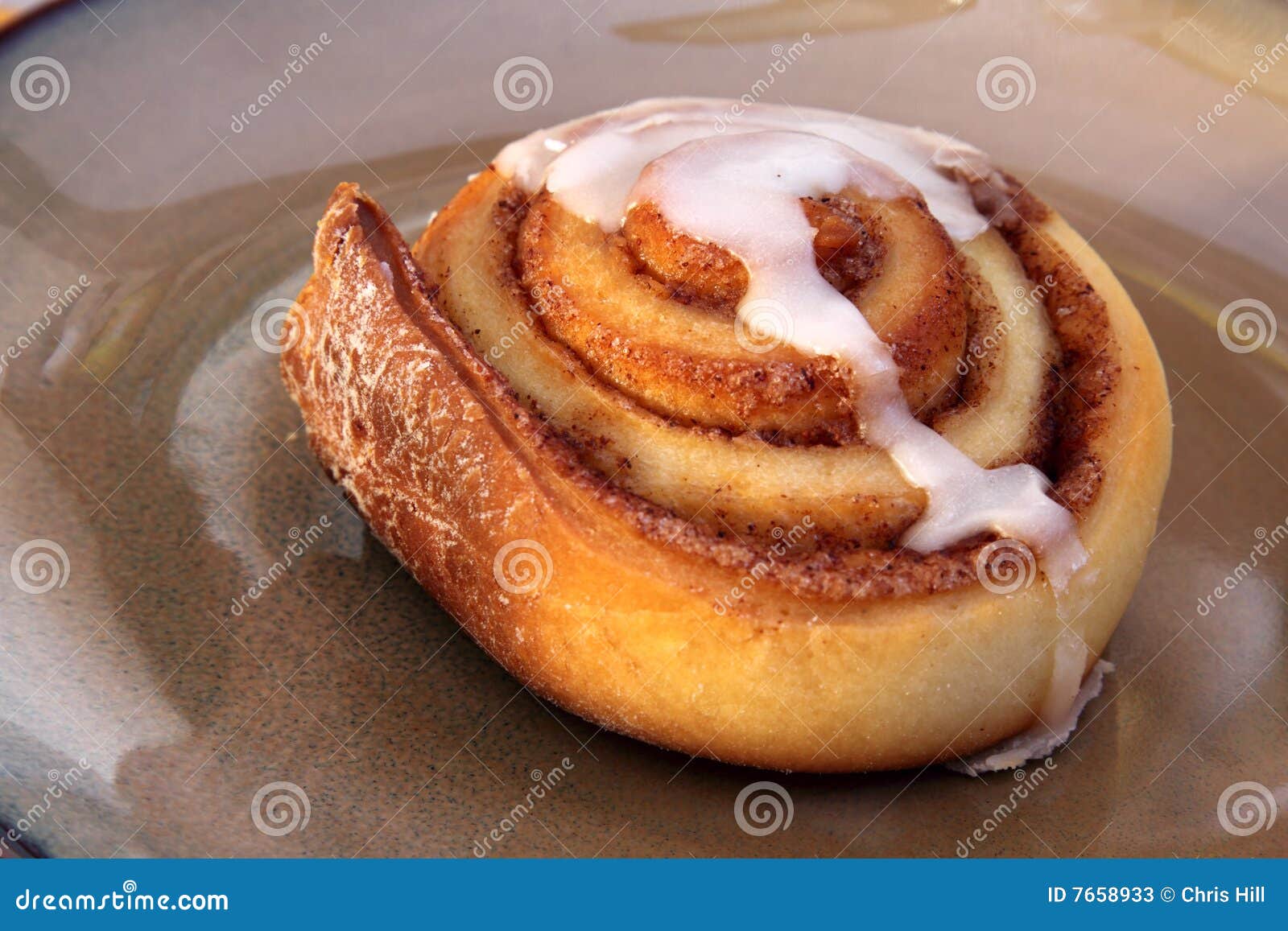 Cinnamon Bun on a Plate stock image. Image of baking, sugar - 7658933