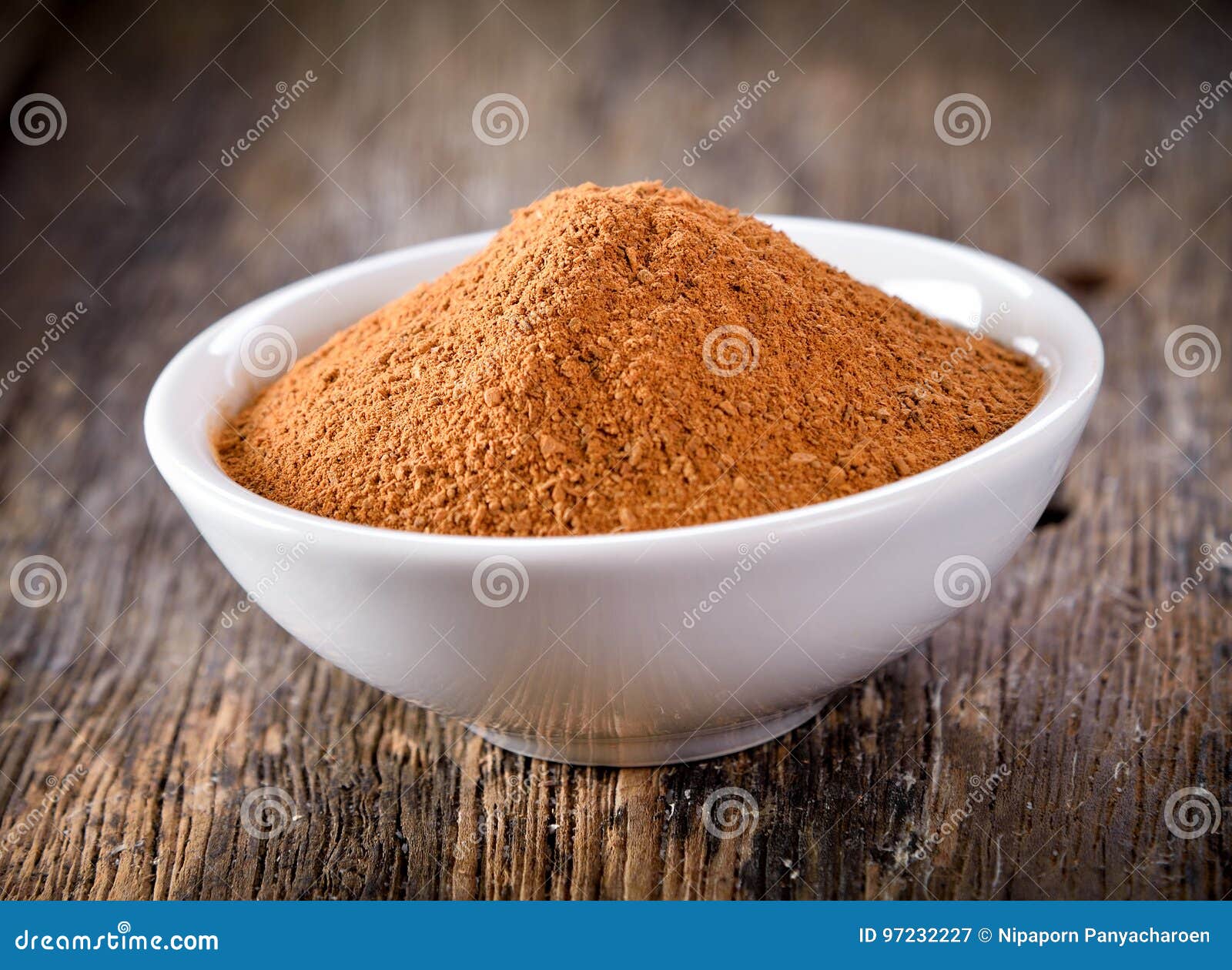 Cinnamon powder in a bowl stock image. Image of healthy - 97232227