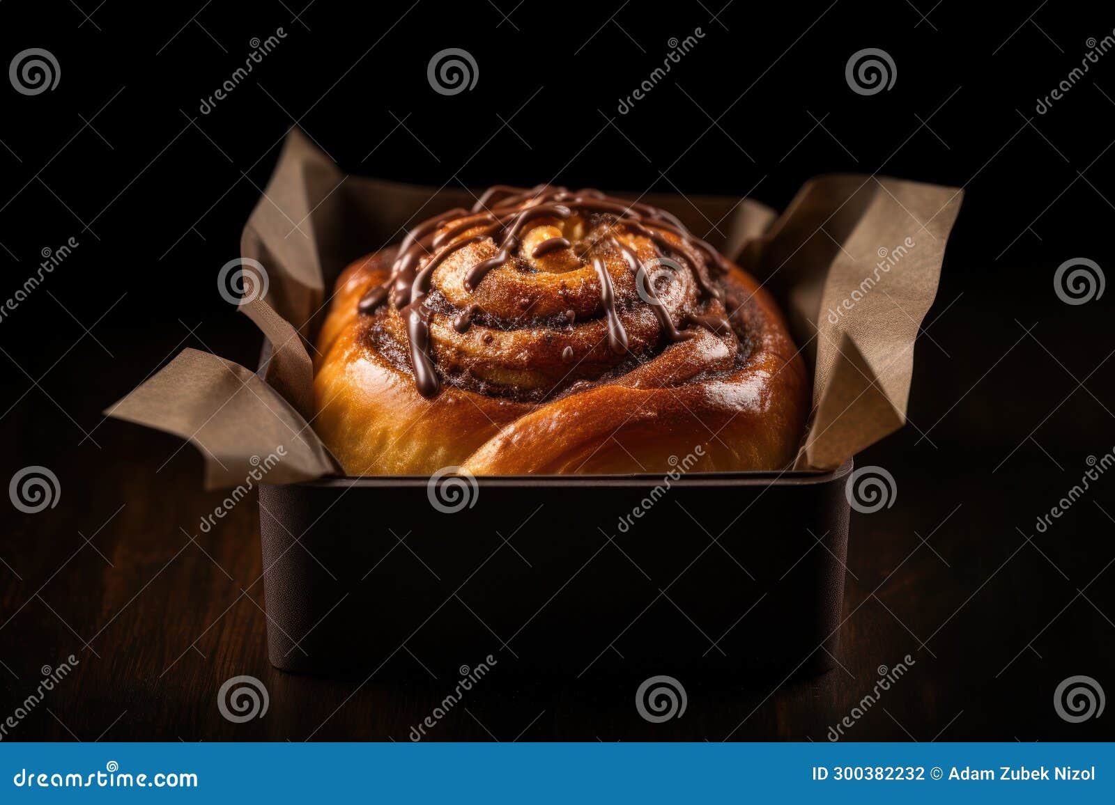 A Cinnamon Roll in a Black Container Stock Illustration - Illustration ...