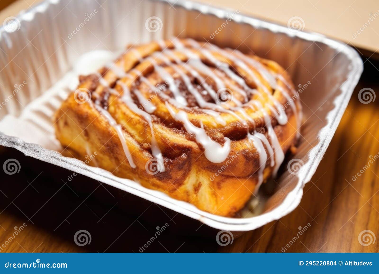 Cinnamon Roll in a To-go Box Handed Over To Customer Stock Photo ...