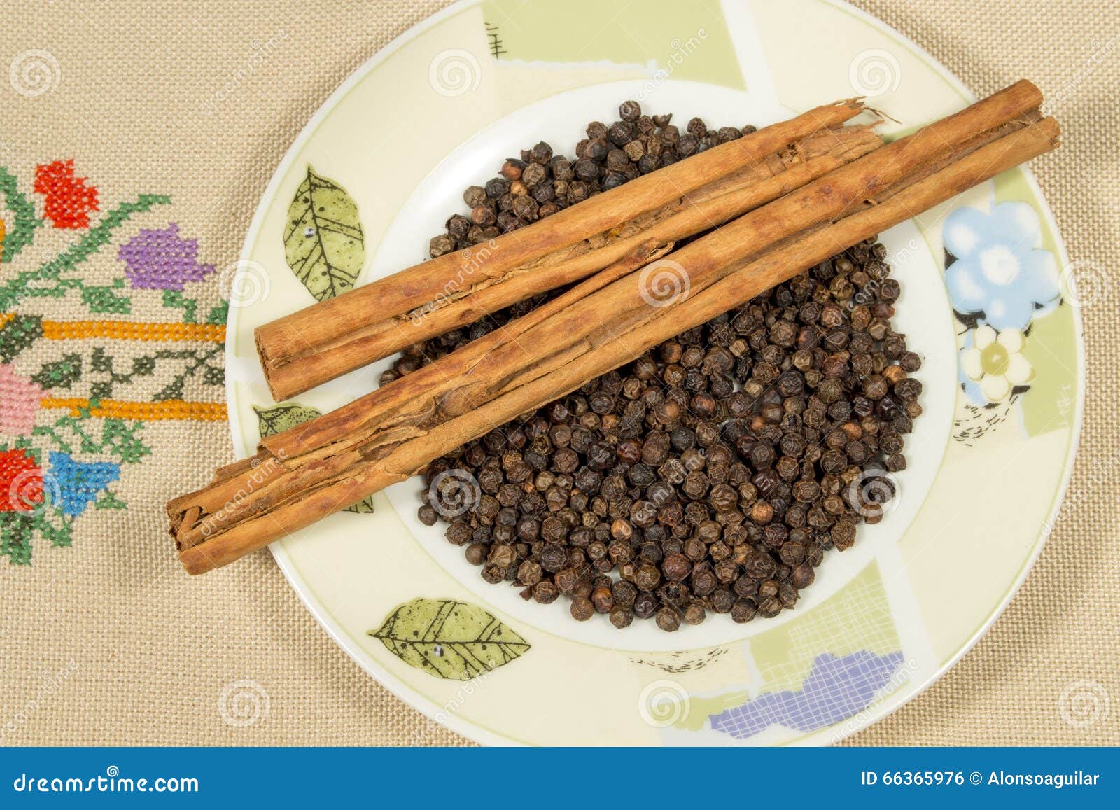 Cinnamon Sticks and Black Pepper Grains Stock Photo - Image of cloth ...